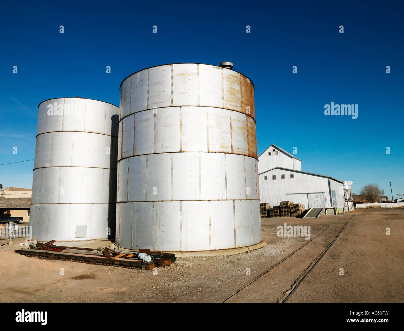 Two silos in rural setting Stock Photo - Alamy