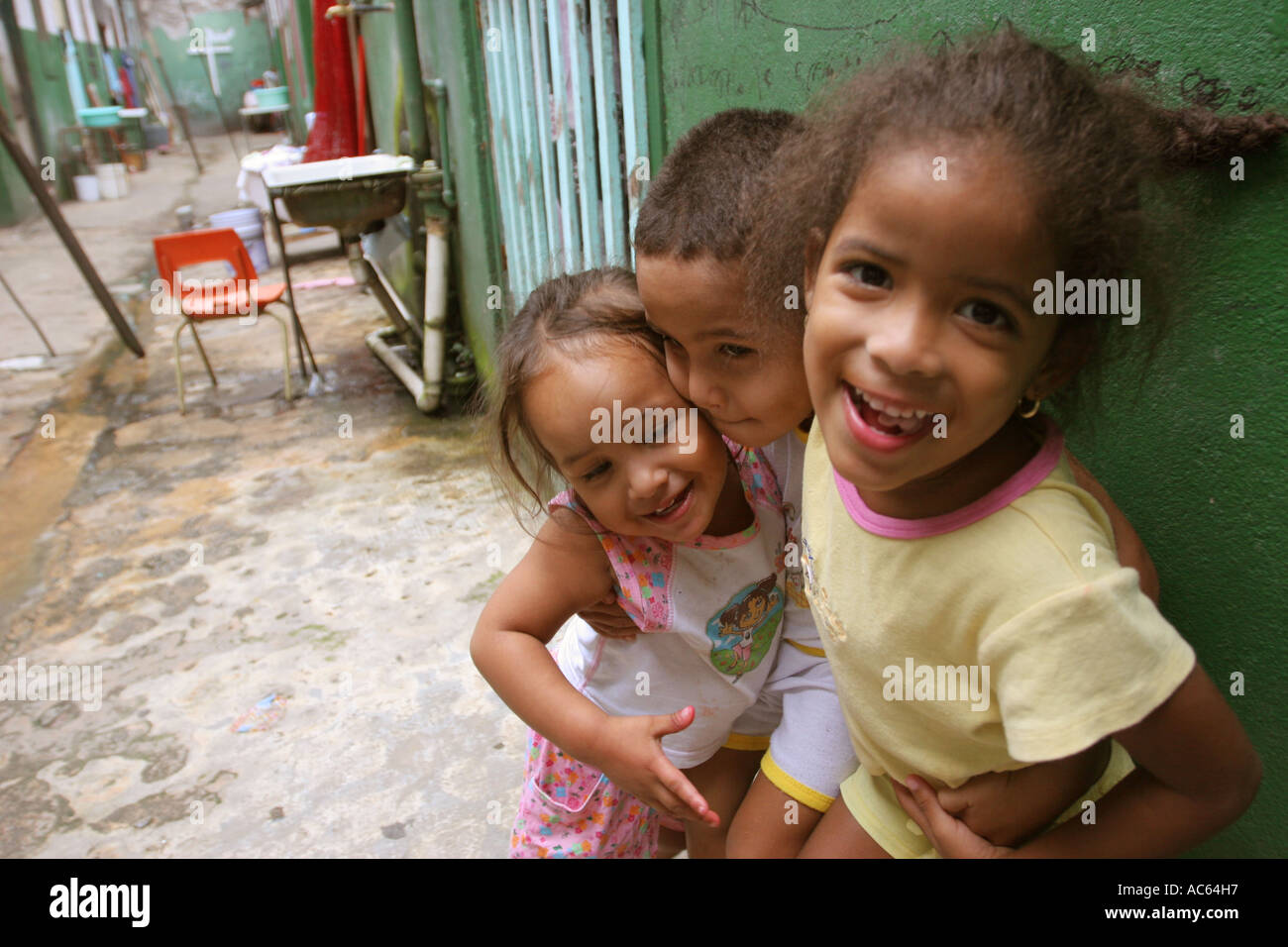 These were children playing in the patio of a house in the old part of ...