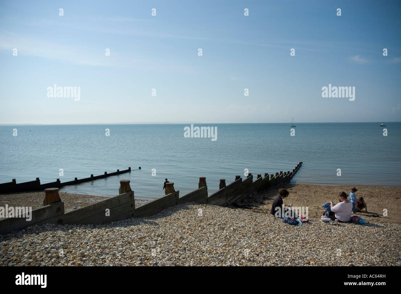 People relax on Whitstable beach, England Stock Photo - Alamy