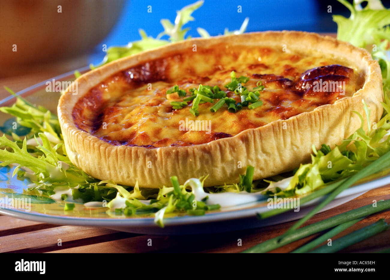 Cheese flan with salad Stock Photo - Alamy