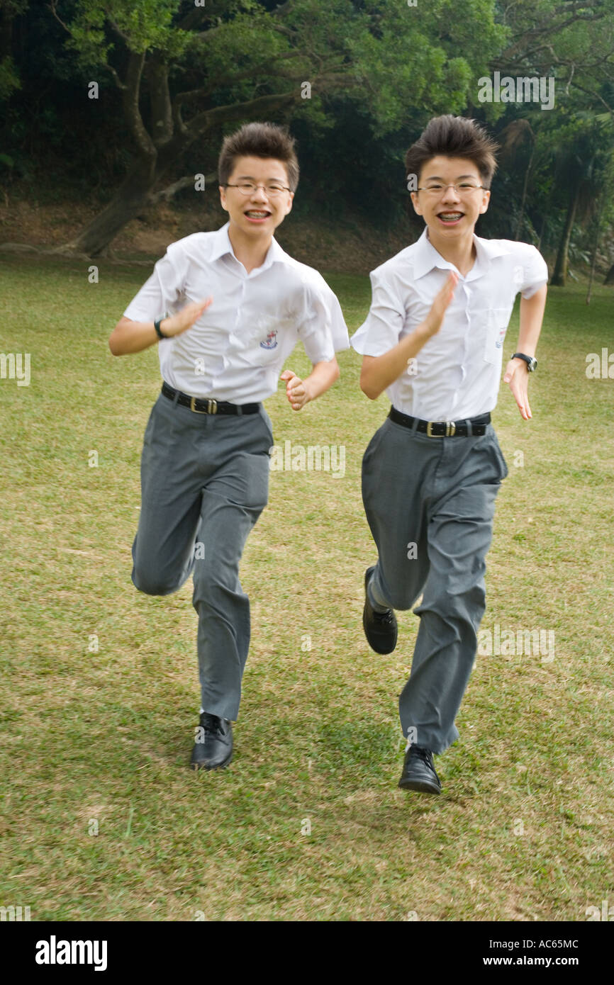 twin boys running Stock Photo - Alamy