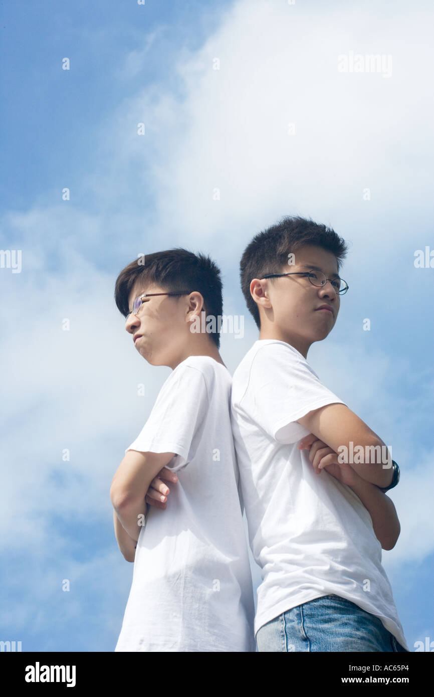 Twin boys back to back hi-res stock photography and images - Alamy