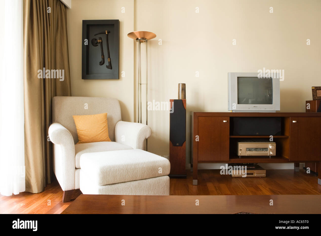 living room with armchair Stock Photo - Alamy