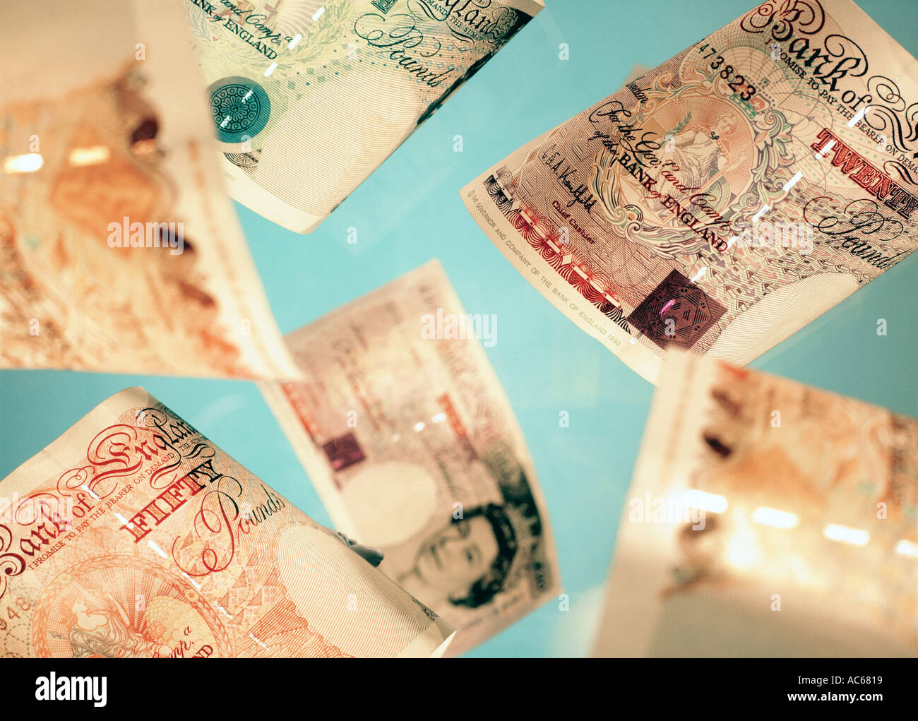UK Falling bank notes Stock Photo - Alamy