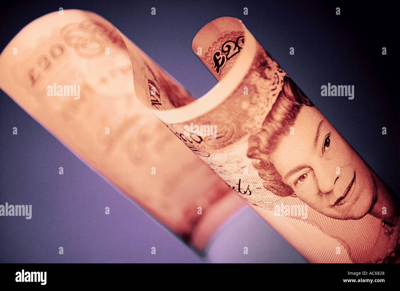 Rolled note uk hi-res stock photography and images - Alamy