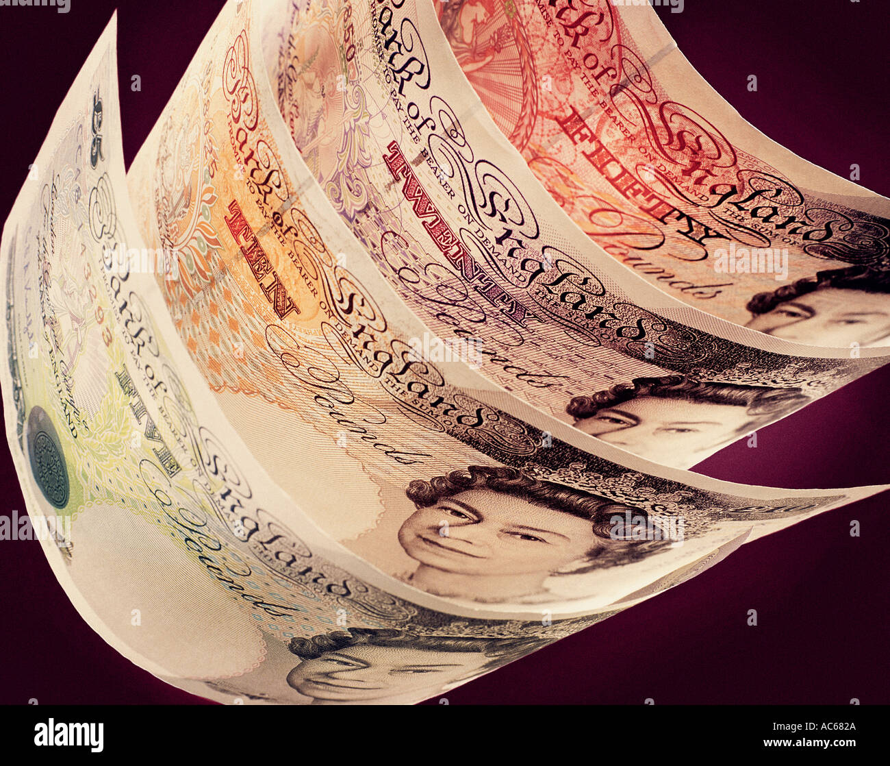 UK Falling bank notes Stock Photo - Alamy