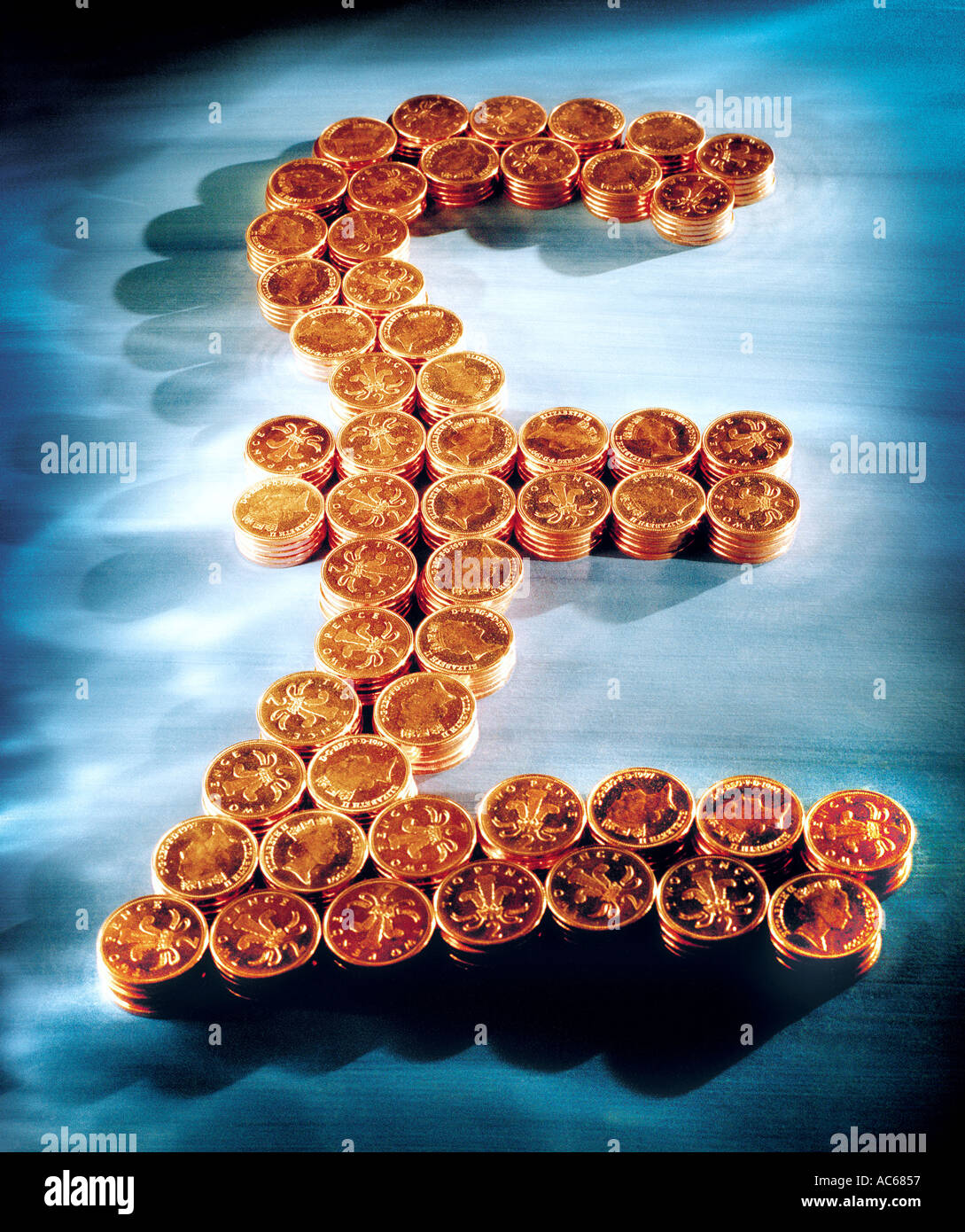 UK coins arranged as pound symbol Stock Photo - Alamy