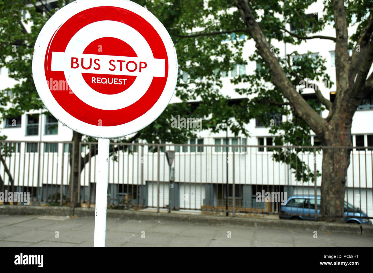 Street Bus stop request signal red and white Stock Photo - Alamy