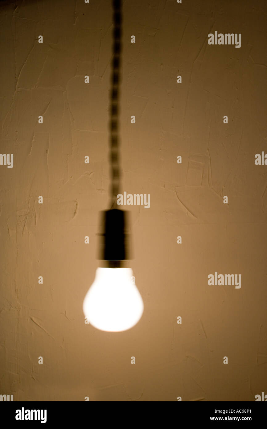Swinging light bulb hi-res stock photography and images - Alamy