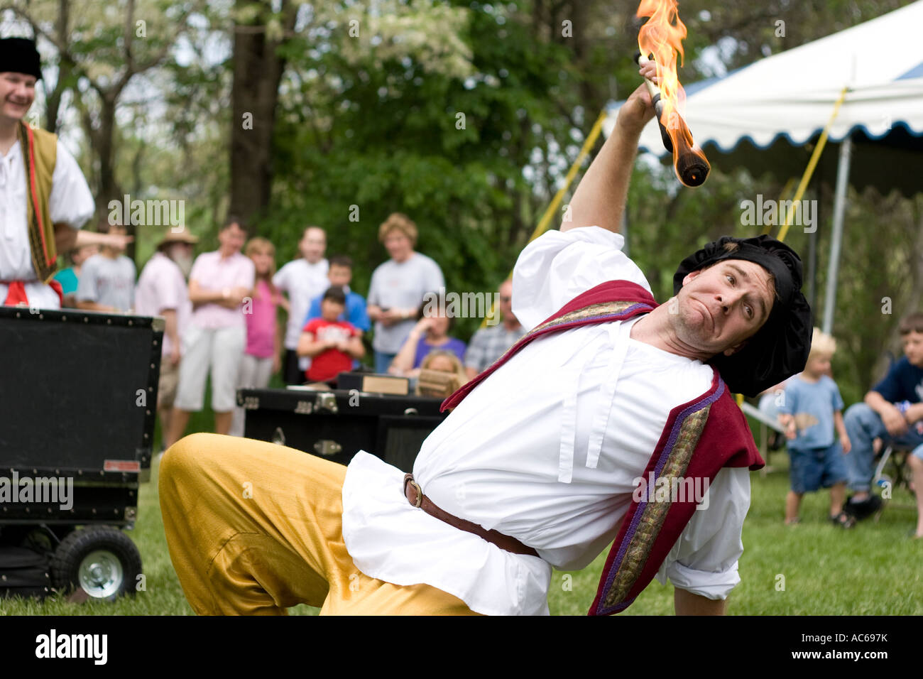 A man prepares to eat fire at a renaissance festival in Nebraska Stock ...