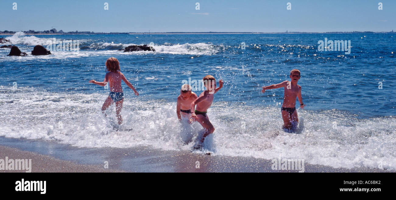 Children playing in the sea Stock Photo - Alamy