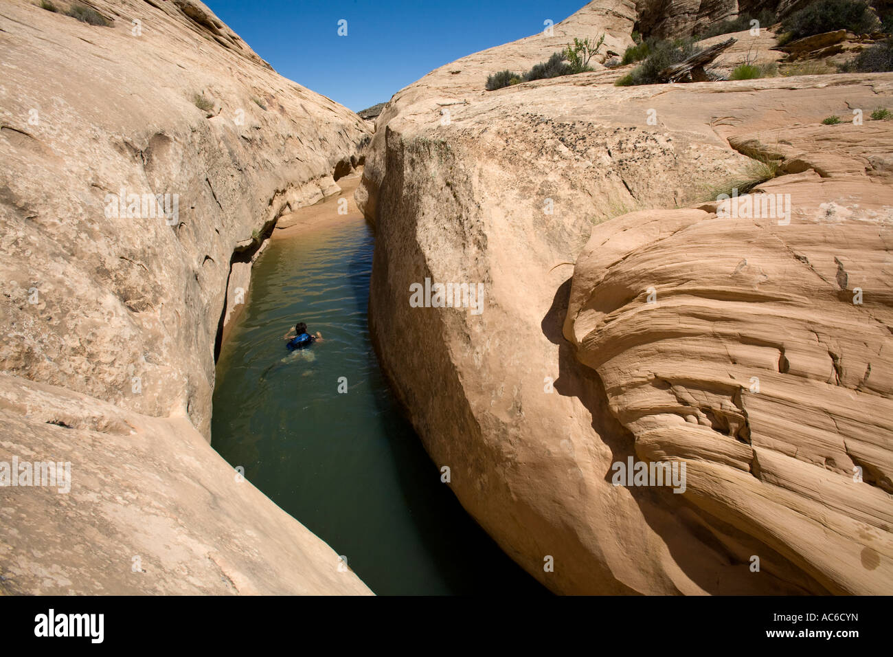 Joao Fortes swims accross a pool in Zero Gravity Canyon in the San ...