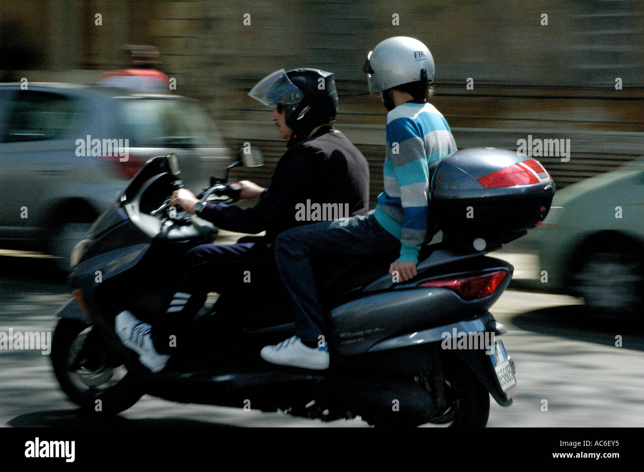 Italian Moped Riders Stock Photo - Alamy