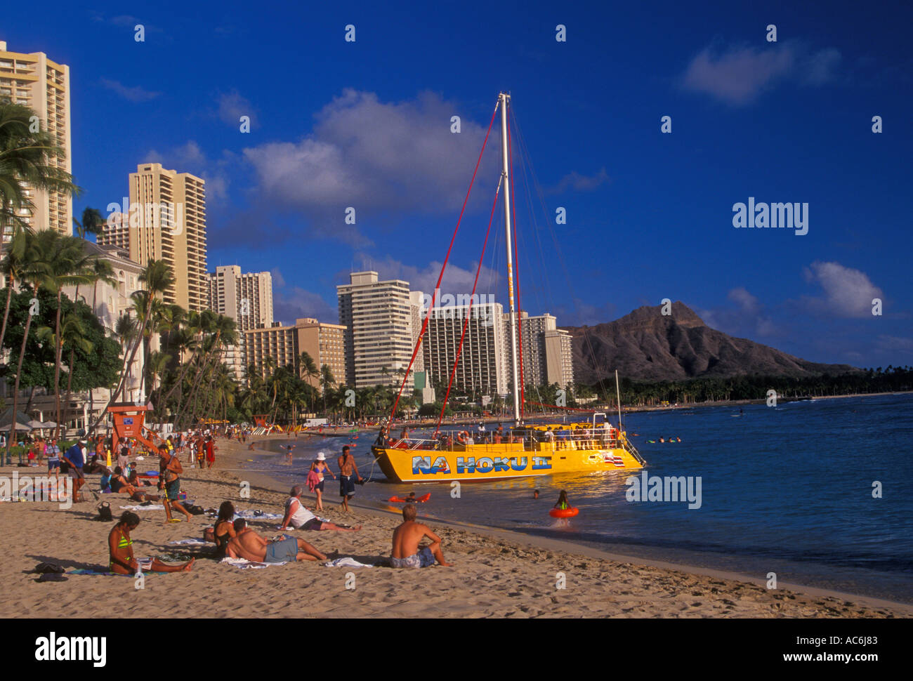 People tourists sunbathers sunbathing swimming hotels Waikiki Beach ...