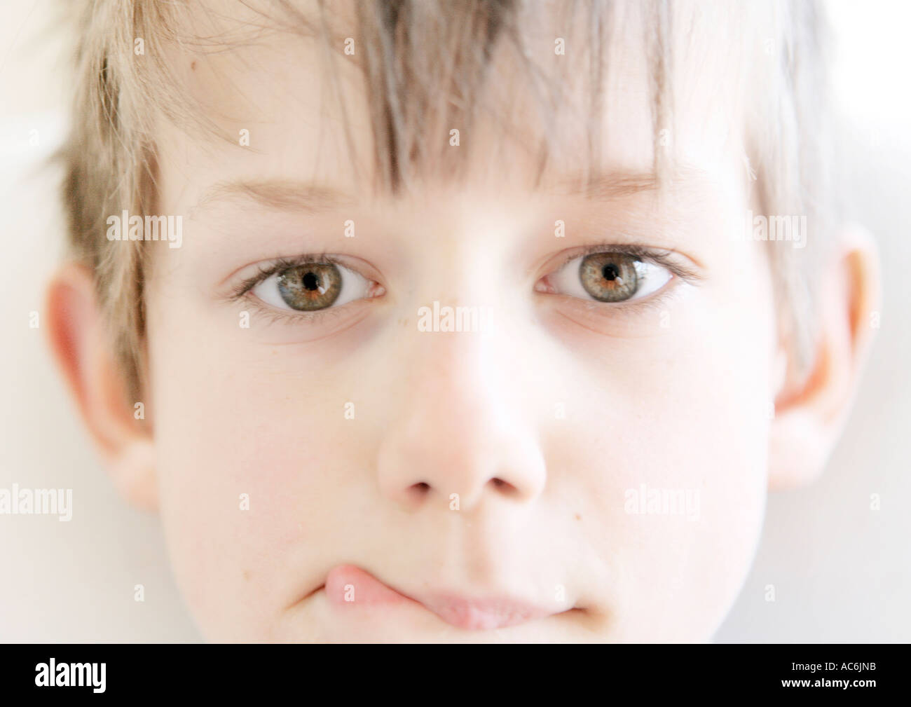 boy pulling funny face Stock Photo - Alamy