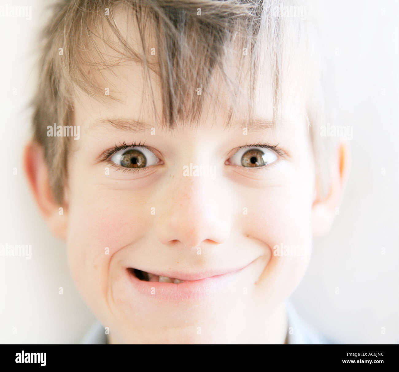 boy pulling funny face Stock Photo - Alamy
