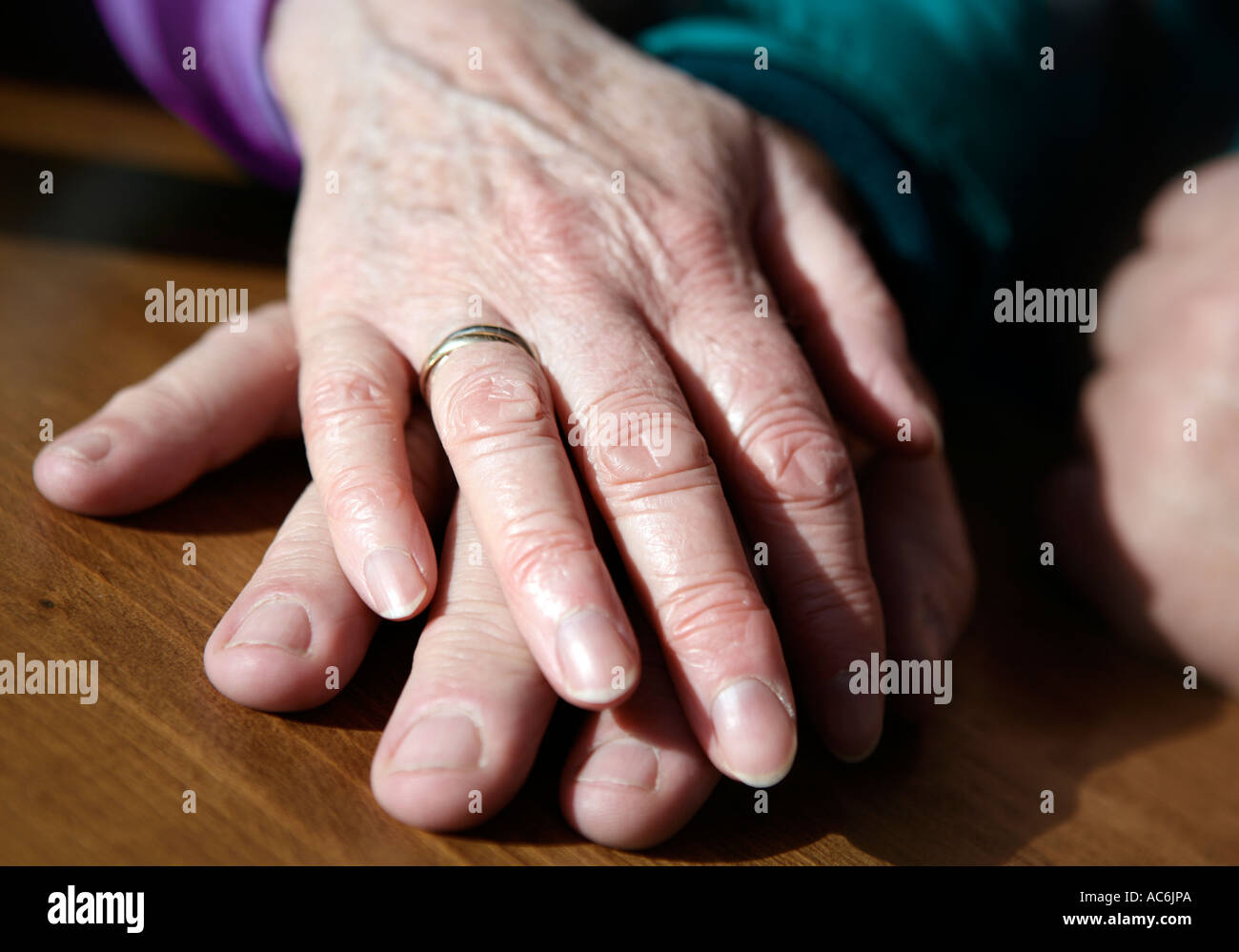 couples hands showing affection Stock Photo - Alamy