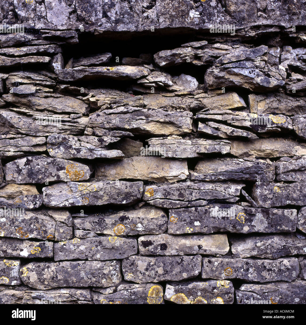 Limestone Wall Weathered and cracked Stock Photo - Alamy