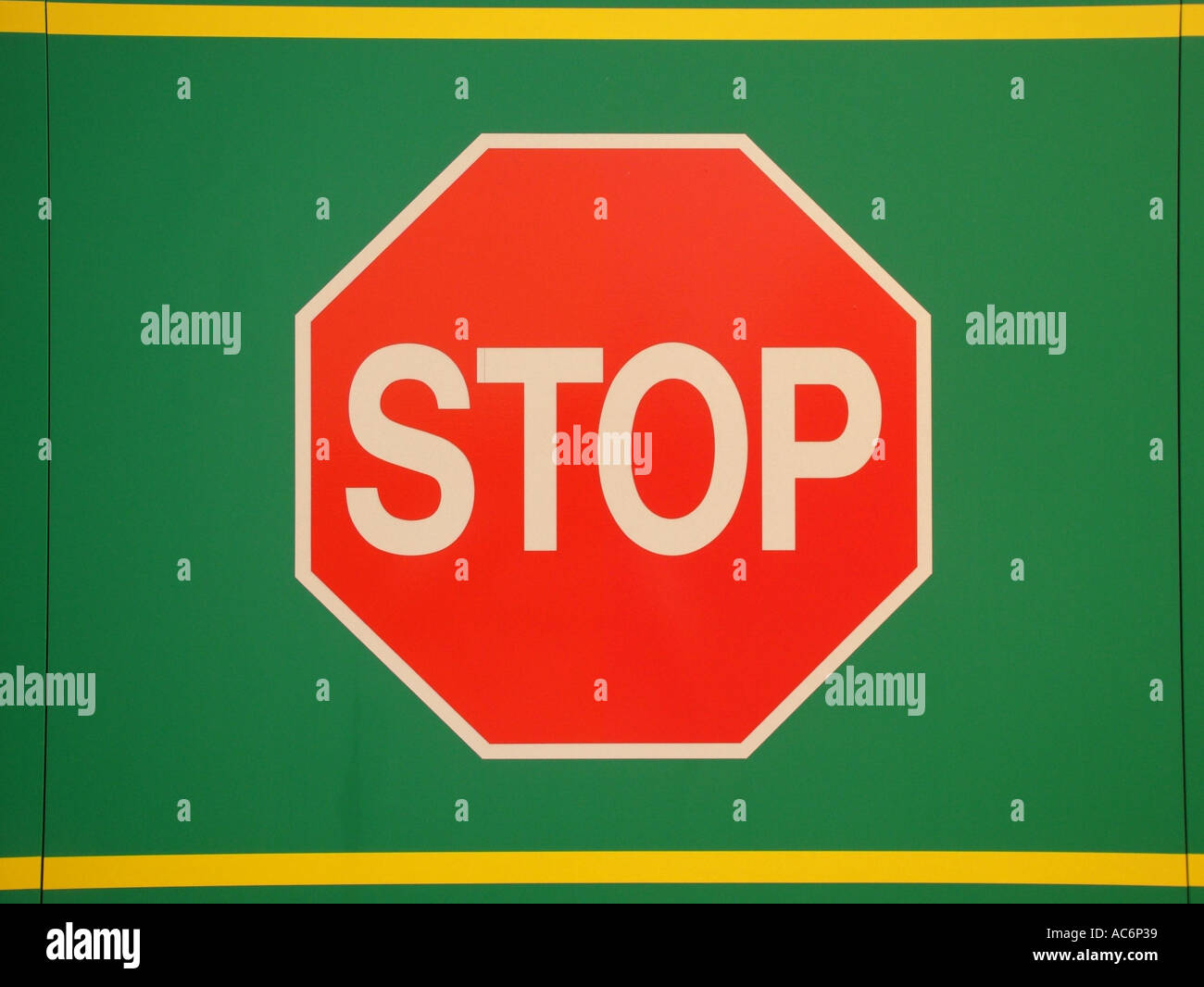 AJD42870, road sign, Stop sign on green background Stock Photo - Alamy
