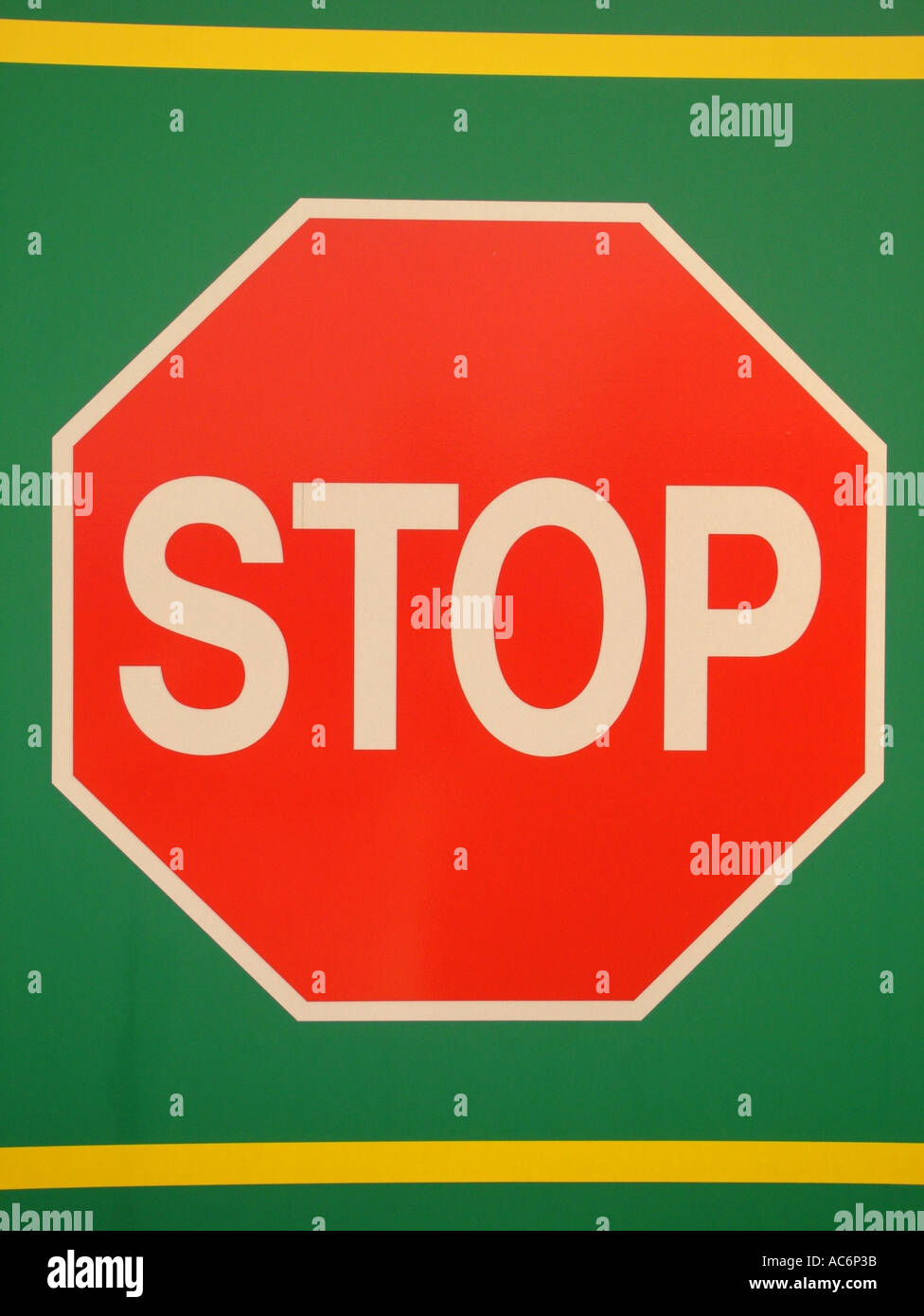 AJD42871, road sign, Stop sign on green background Stock Photo - Alamy