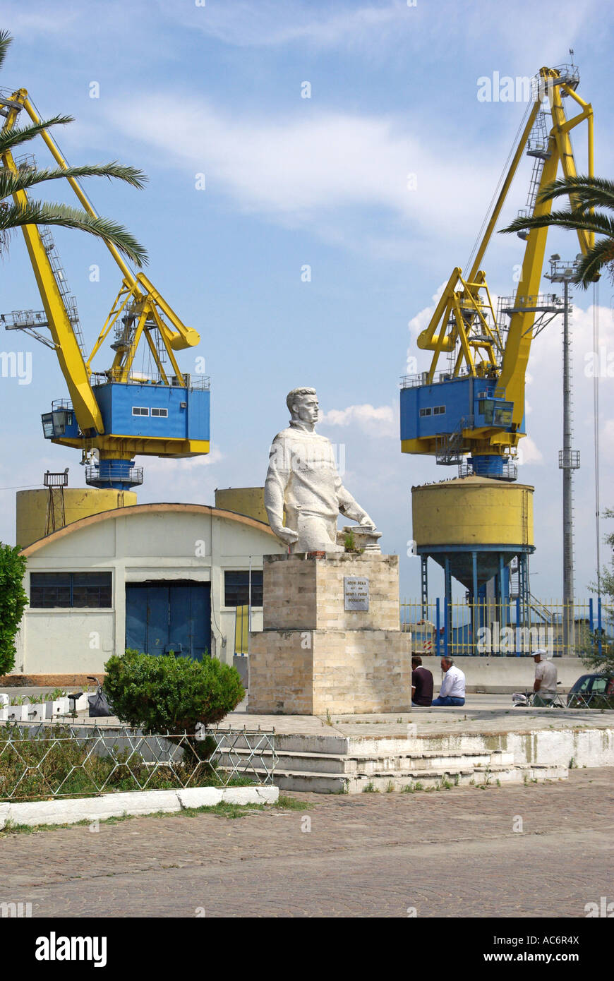 Durres port on Adriatic coast yellow & blue dockside cranes & silos ...