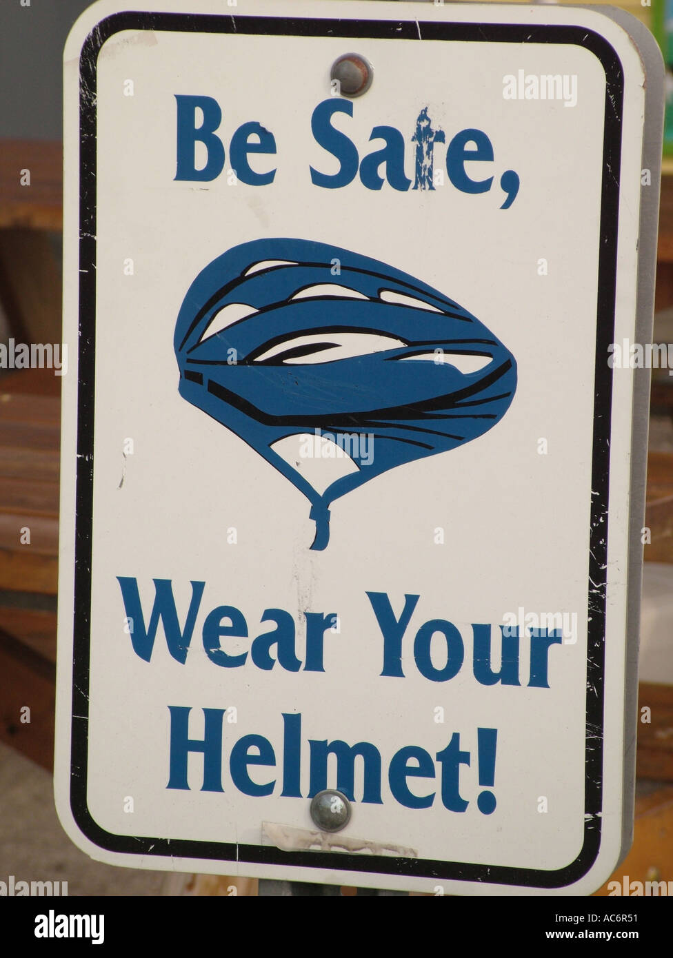 AJD42984, sign, Be Safe, Wear Your Helmet, Bike Safety Stock Photo - Alamy