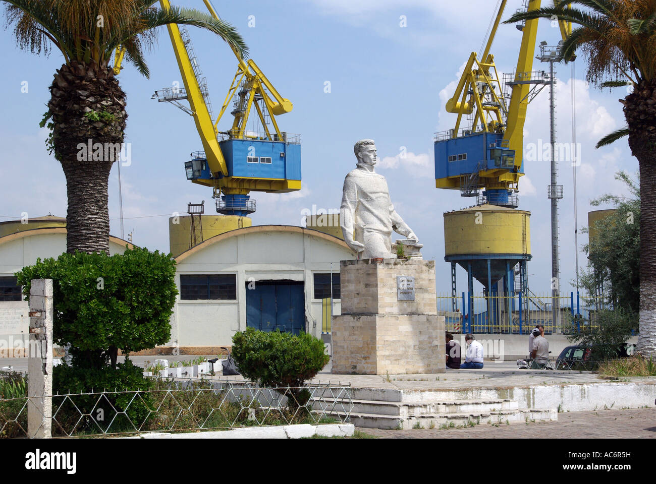 Durres port on Adriatic coast yellow & blue dockside cranes & silos ...
