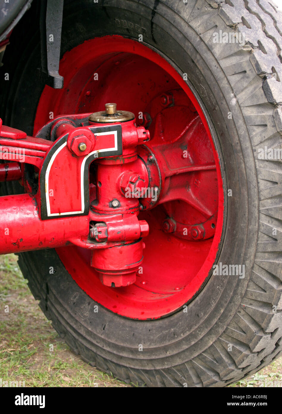 Close-up of red wheel of steam lorry Stock Photo - Alamy
