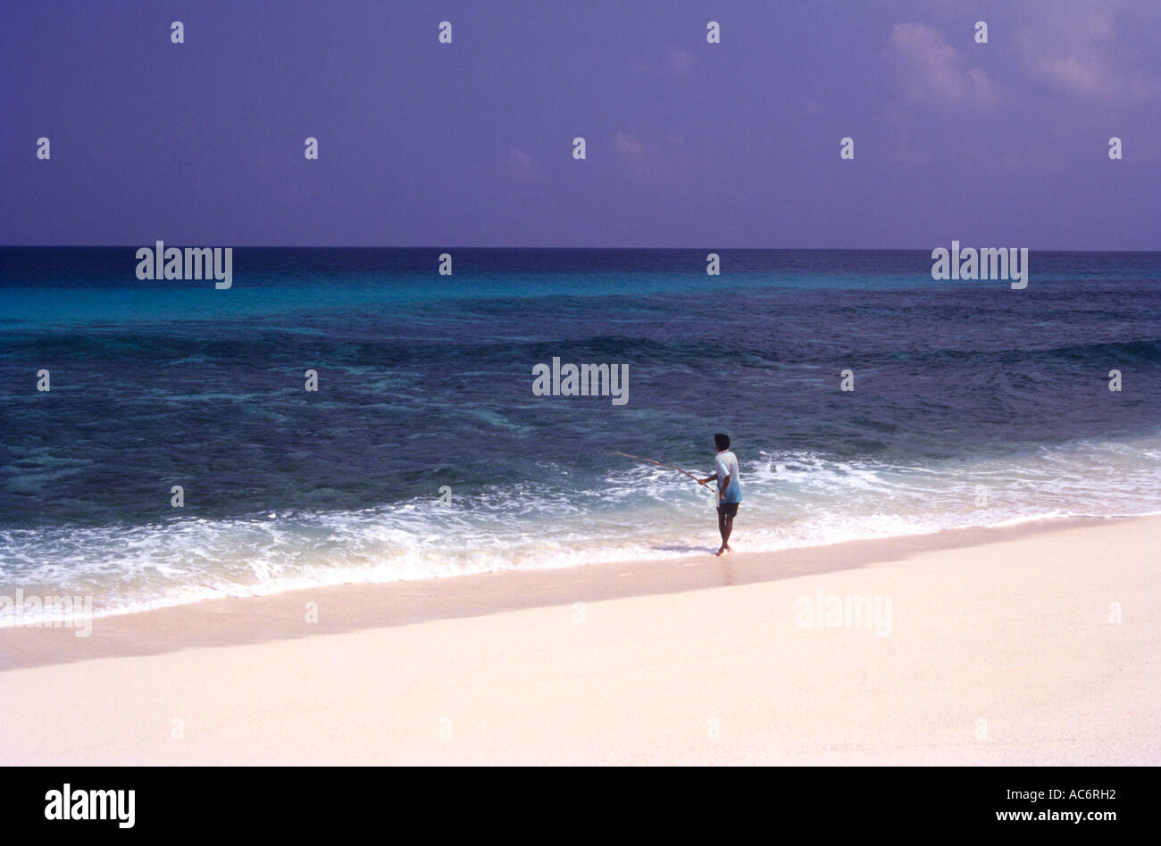 FISHING FROM SHORE ANDROTT ISLAND Stock Photo - Alamy