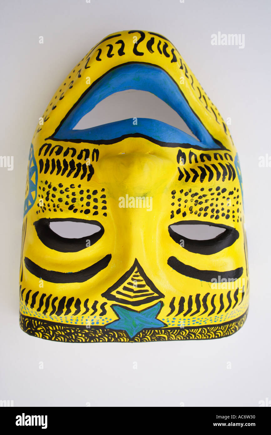 YELLOW AND BLUE PAINTED MASK ON WHITE BACKGROUND BAPD2378 Stock Photo ...