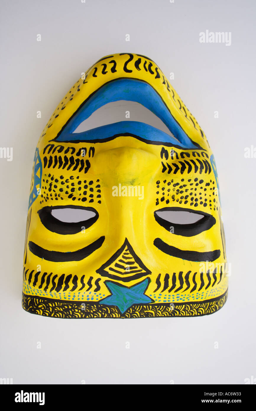 YELLOW AND BLUE PAINTED MASK ON WHITE BACKGROUND BAPD2379 Stock Photo ...