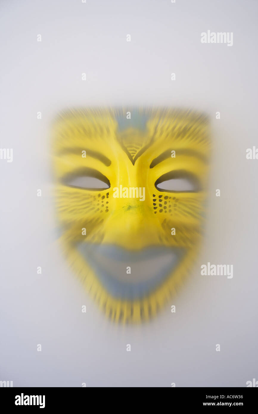 YELLOW AND BLUE PAINTED MASK ON WHITE BACKGROUND BAPD2380 Stock Photo ...