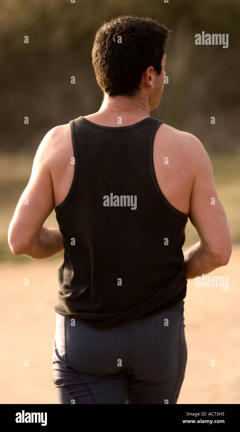 back of man jogging Stock Photo - Alamy