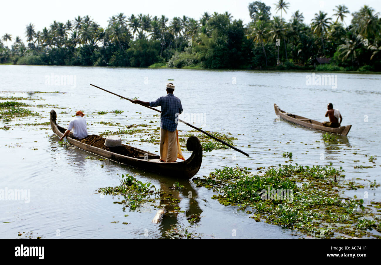 COUNTRY BOAT WITH TOURIST MOVING ACROSS KUTTANAD CANAL Stock Photo - Alamy