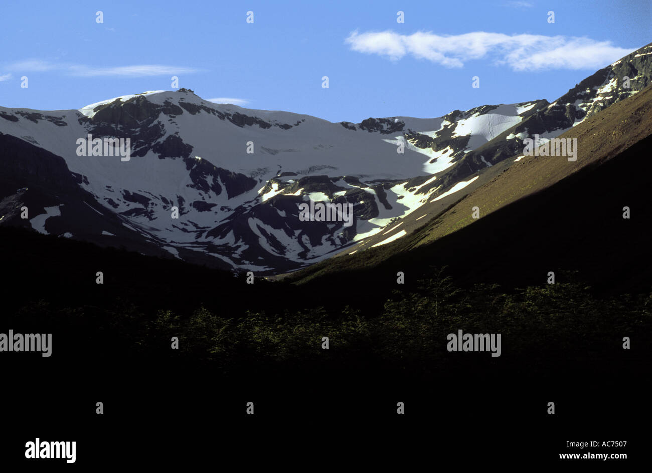 SNOW CAPPED ANDES PEAK in ASCENSIO VALLEY in TORRES DEL PAINE NATIONAL ...