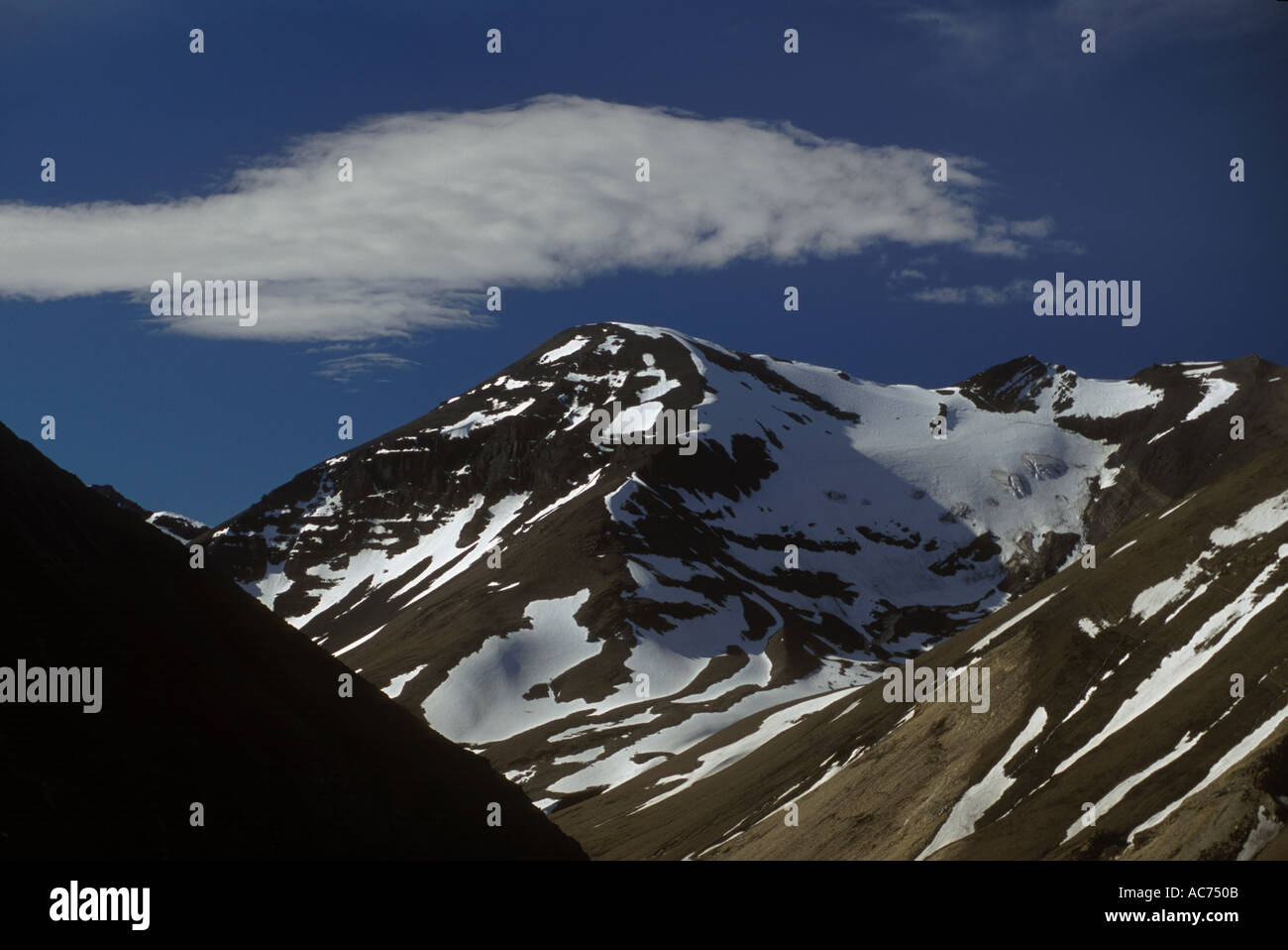 SNOW CAPPED ANDES PEAK in ASCENSIO VALLEY in TORRES DEL PAINE NATIONAL ...