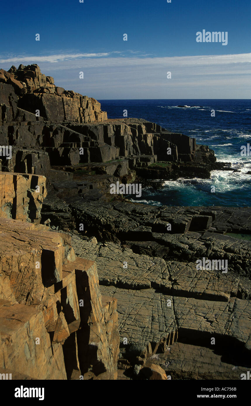 The PACIFIC OCEAN smashes into the rocky shore of LOS MOLLES a beach ...