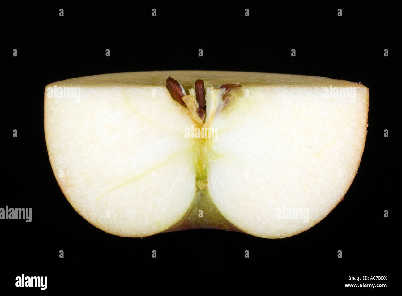 Half of an apple, black background Stock Photo - Alamy