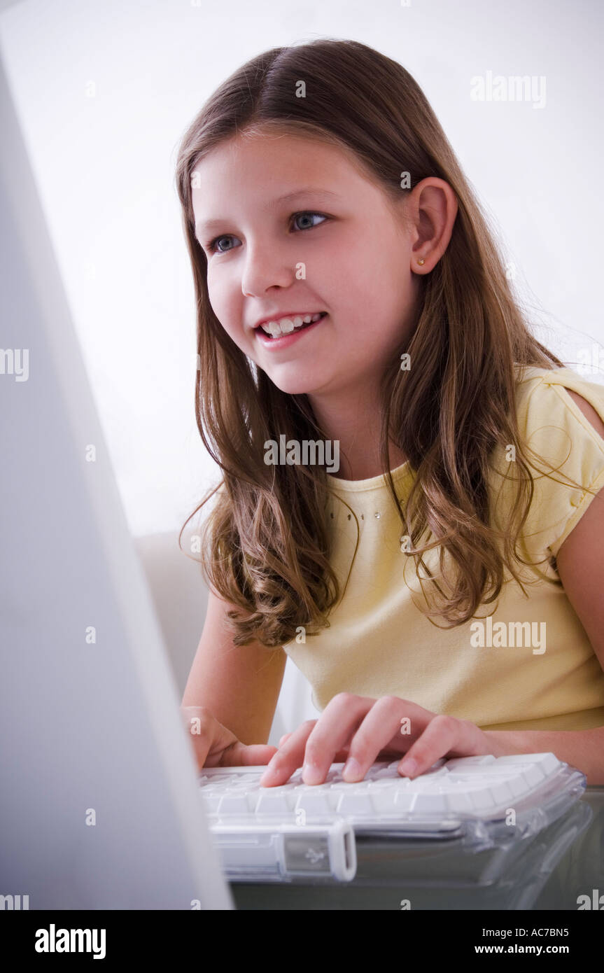 Girl at computer Stock Photo - Alamy