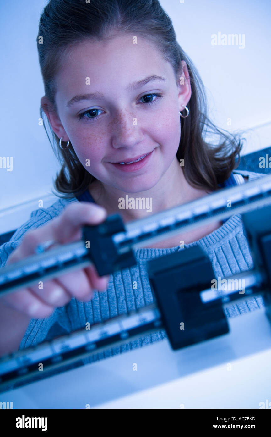 Nurse weighing patient on scale hi-res stock photography and images - Alamy
