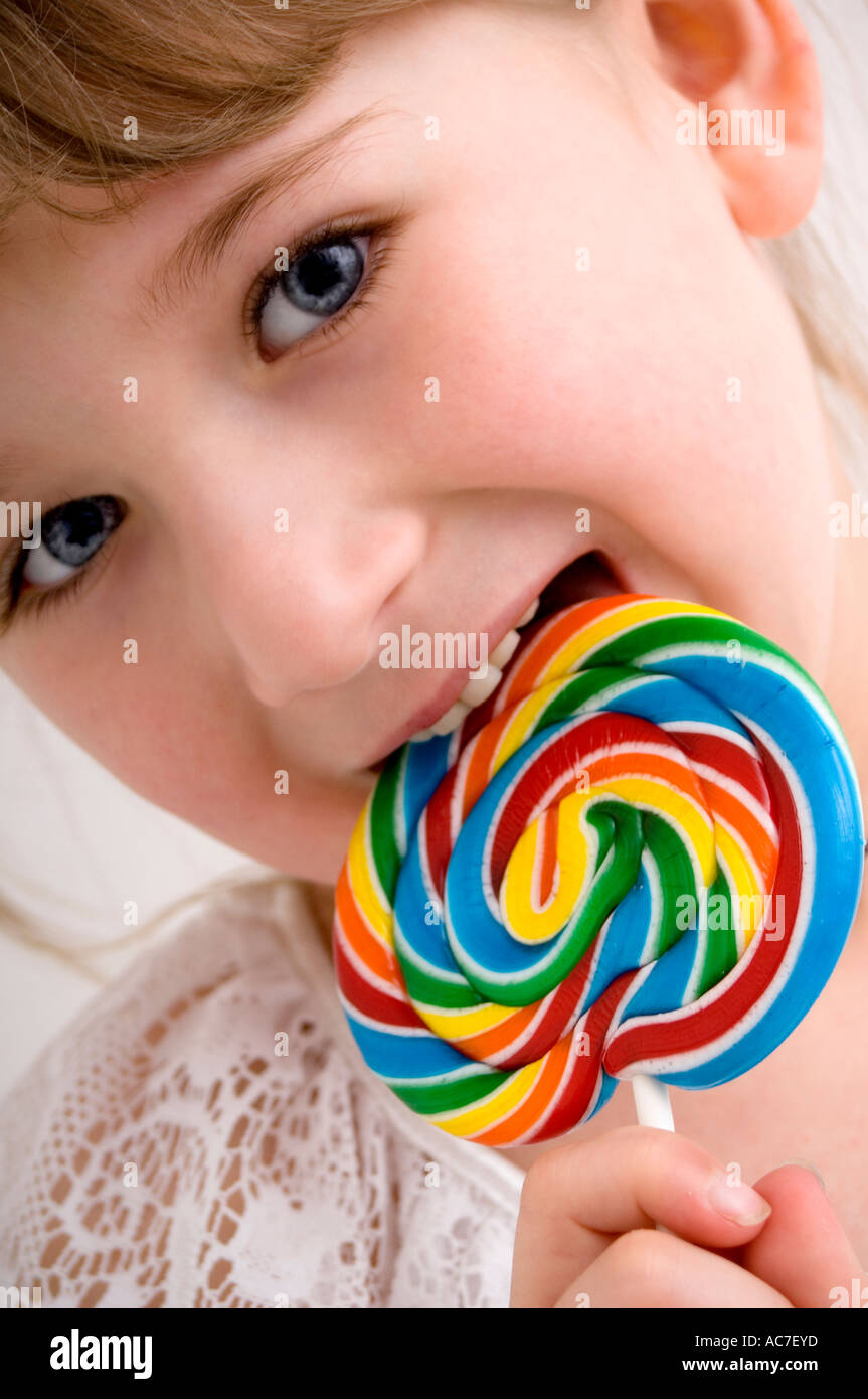 Girl with lollipop Stock Photo - Alamy