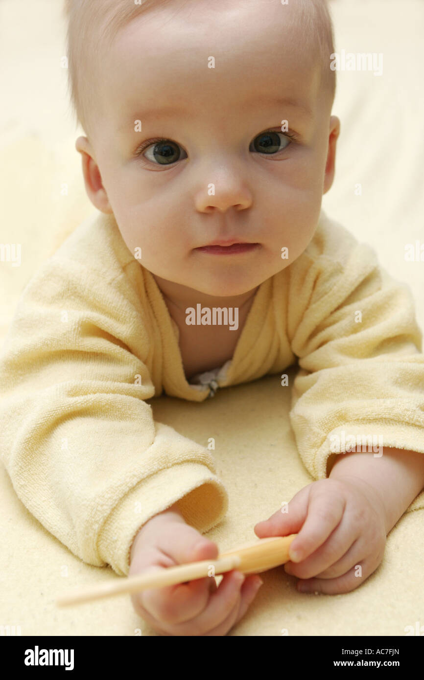 Portrait of baby with comb Stock Photo - Alamy