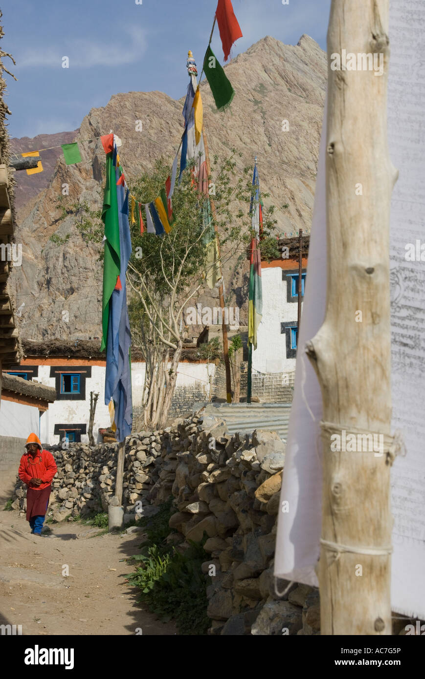 India Himachal Pradesh Spiti Pin valley Mud man in red walking in ...