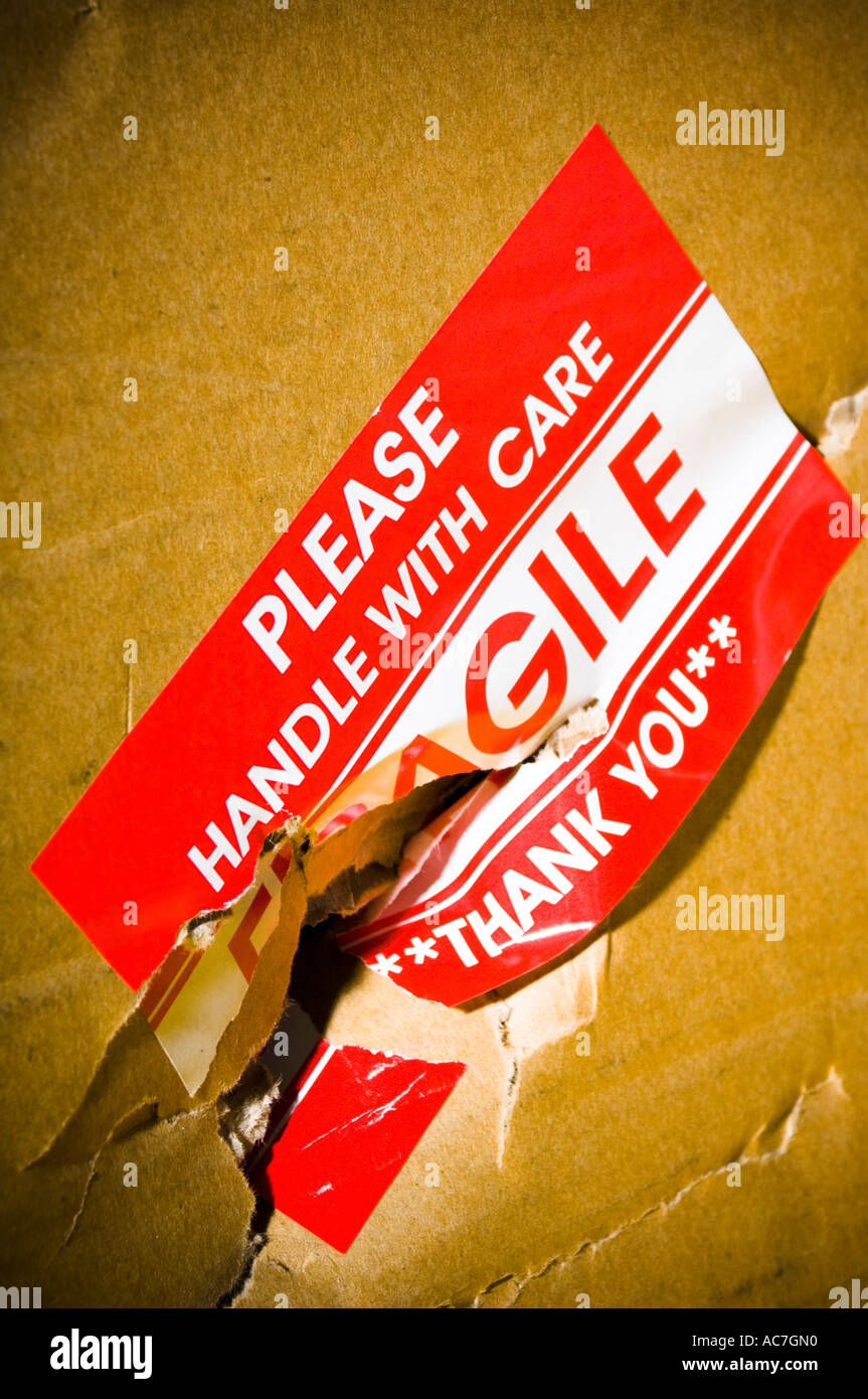 Fragile sticker on package Stock Photo - Alamy