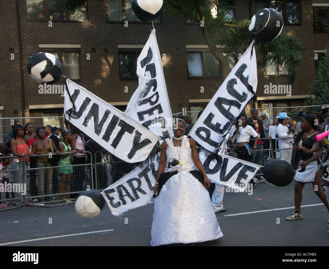 a striking peace love and unity costume worn by a participant in the ...