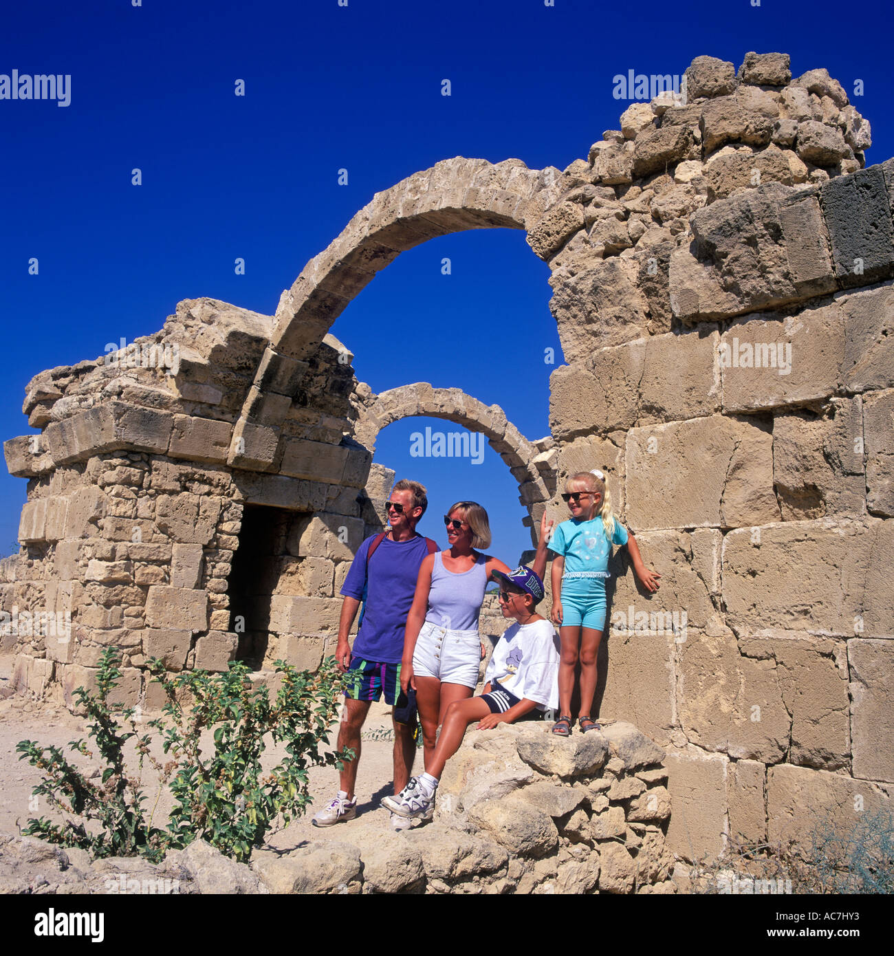 FAMILY SIGHTSEEING AT RUINS IN PAPHOS CYPRUS Stock Photo - Alamy