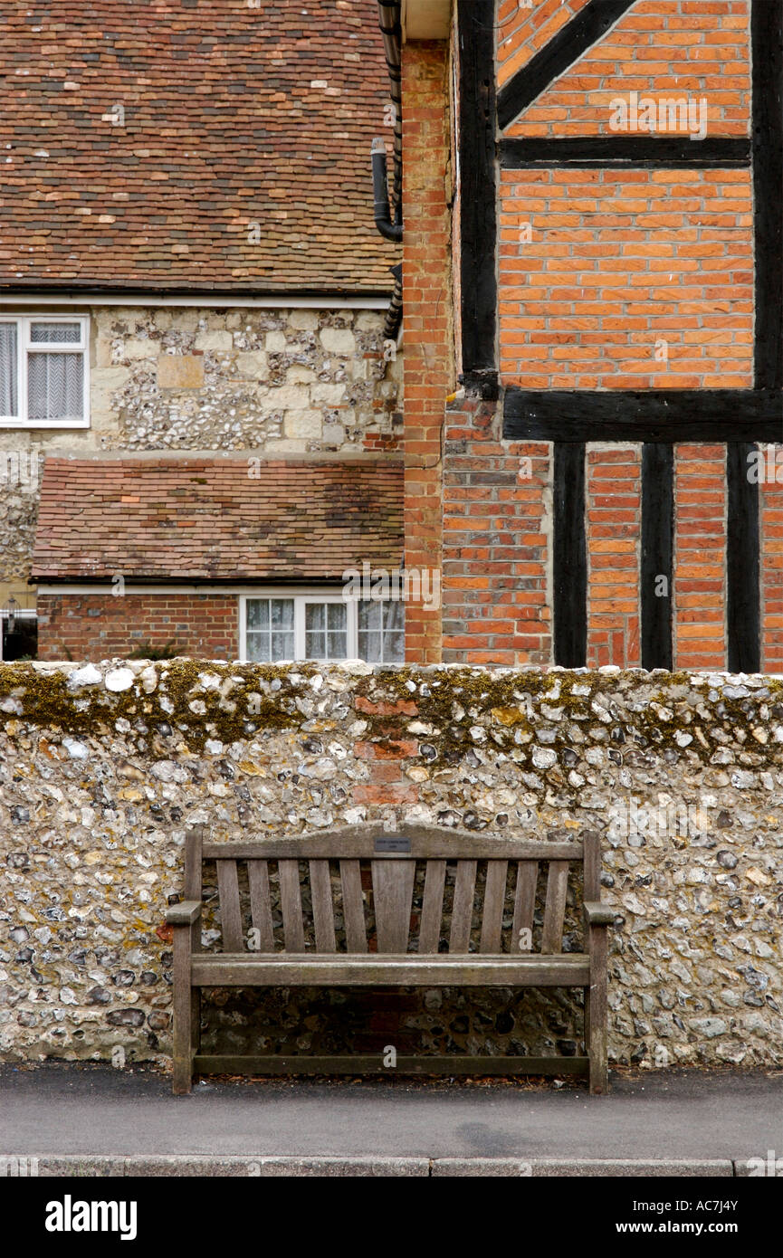 Bench in front of a house with wooden timbers Stock Photo - Alamy