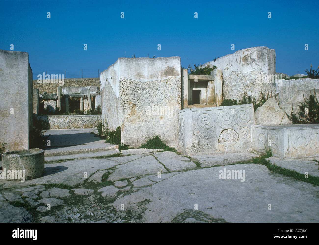 carved and decorated stone slabs and altars within the Tarxien Temple ...