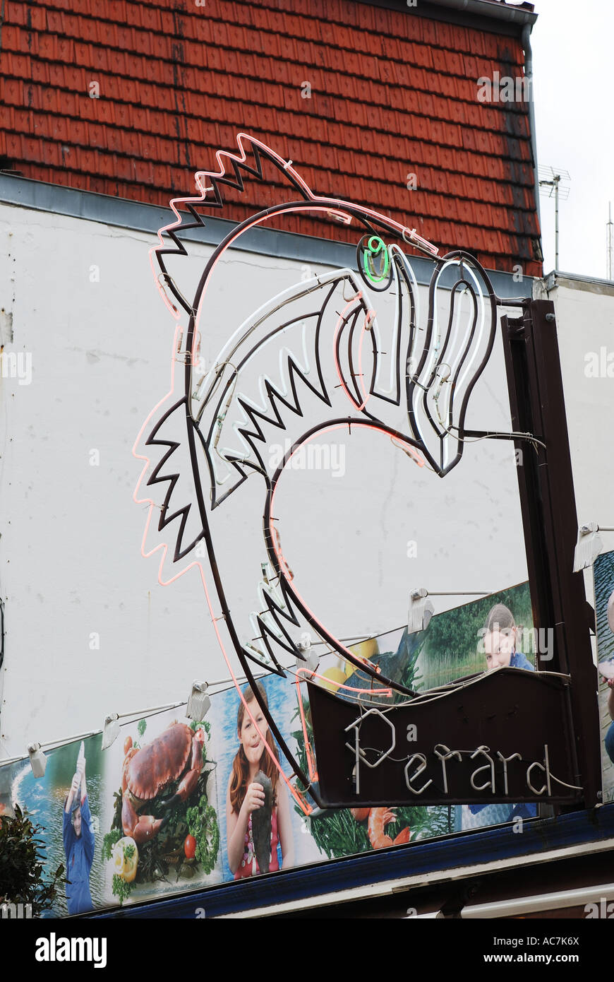 FISH SIGN ABOVE FAMOUS FISH RESTAURANT "PERARD" ON THE RUE METZ IN LE ...