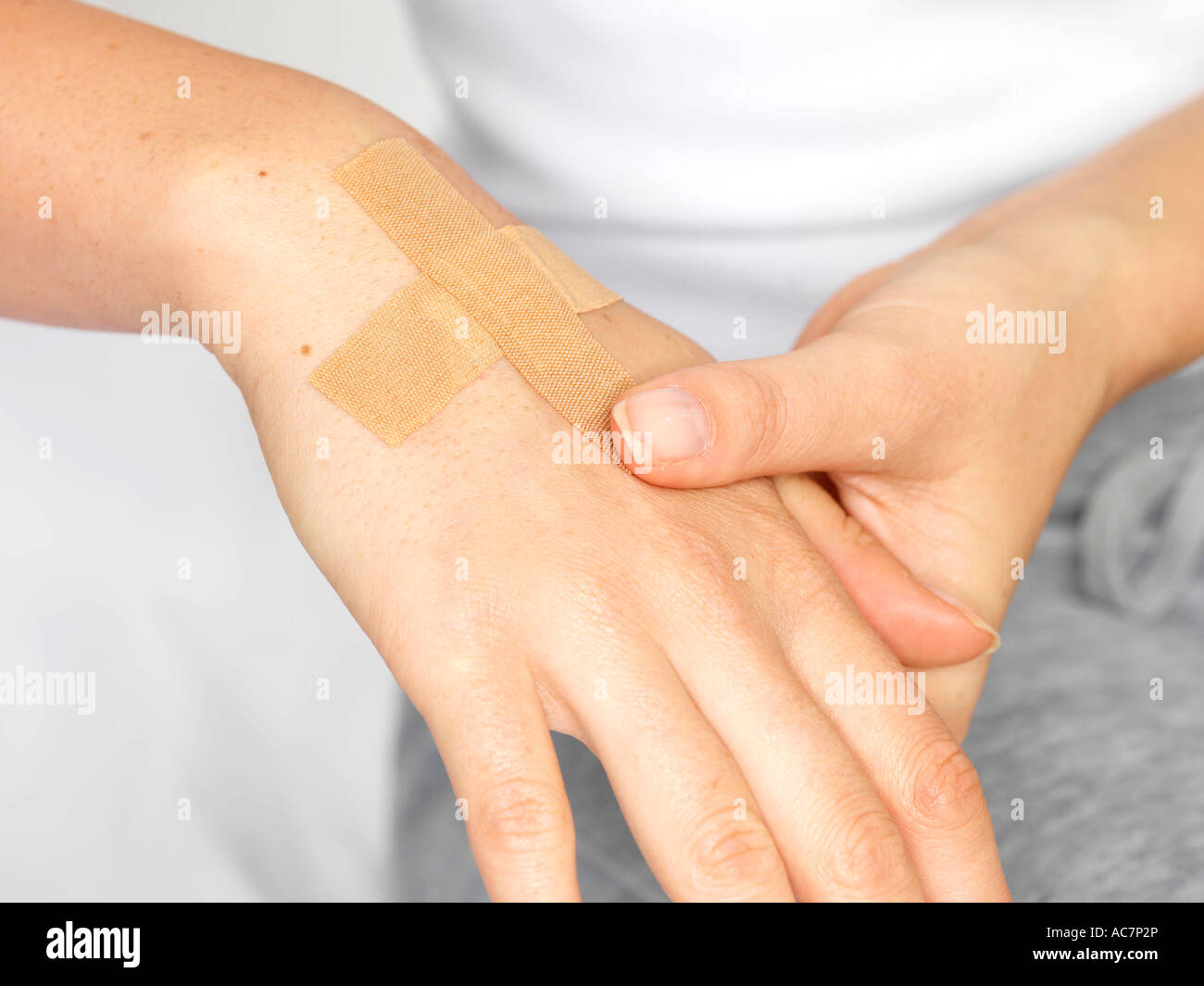 Young Woman Applying Plaster Model Released Stock Photo - Alamy